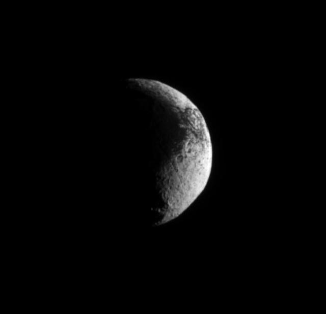 Iapetus' Puzzling Surface - NASA Science