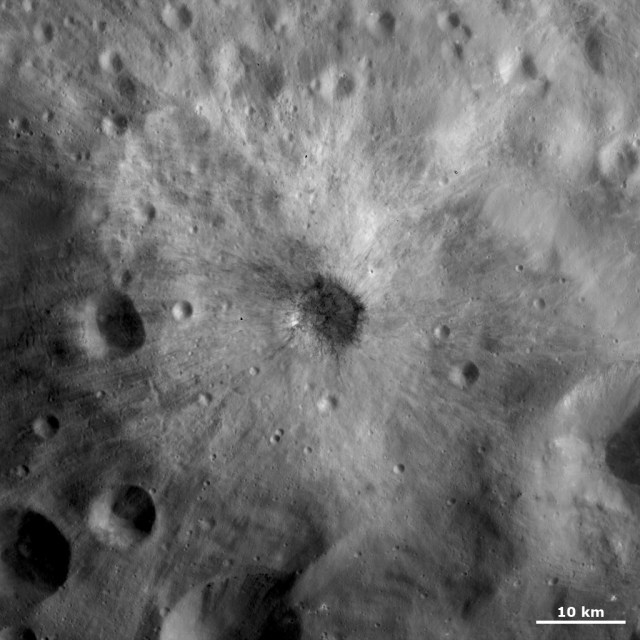 Crater with Dark and Bright Ejecta - NASA Science