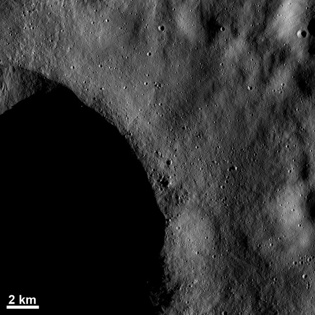 Blocks of Ejected Material and Small Craters Near a Crater Rim - NASA ...