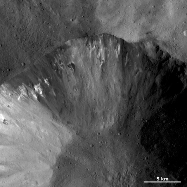 Dark and Bright Material in a Crater Wall - NASA Science