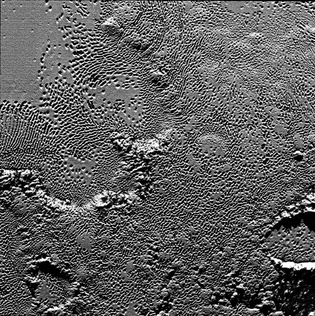 Zooming in on Pluto's Pattern of Pits - NASA Science