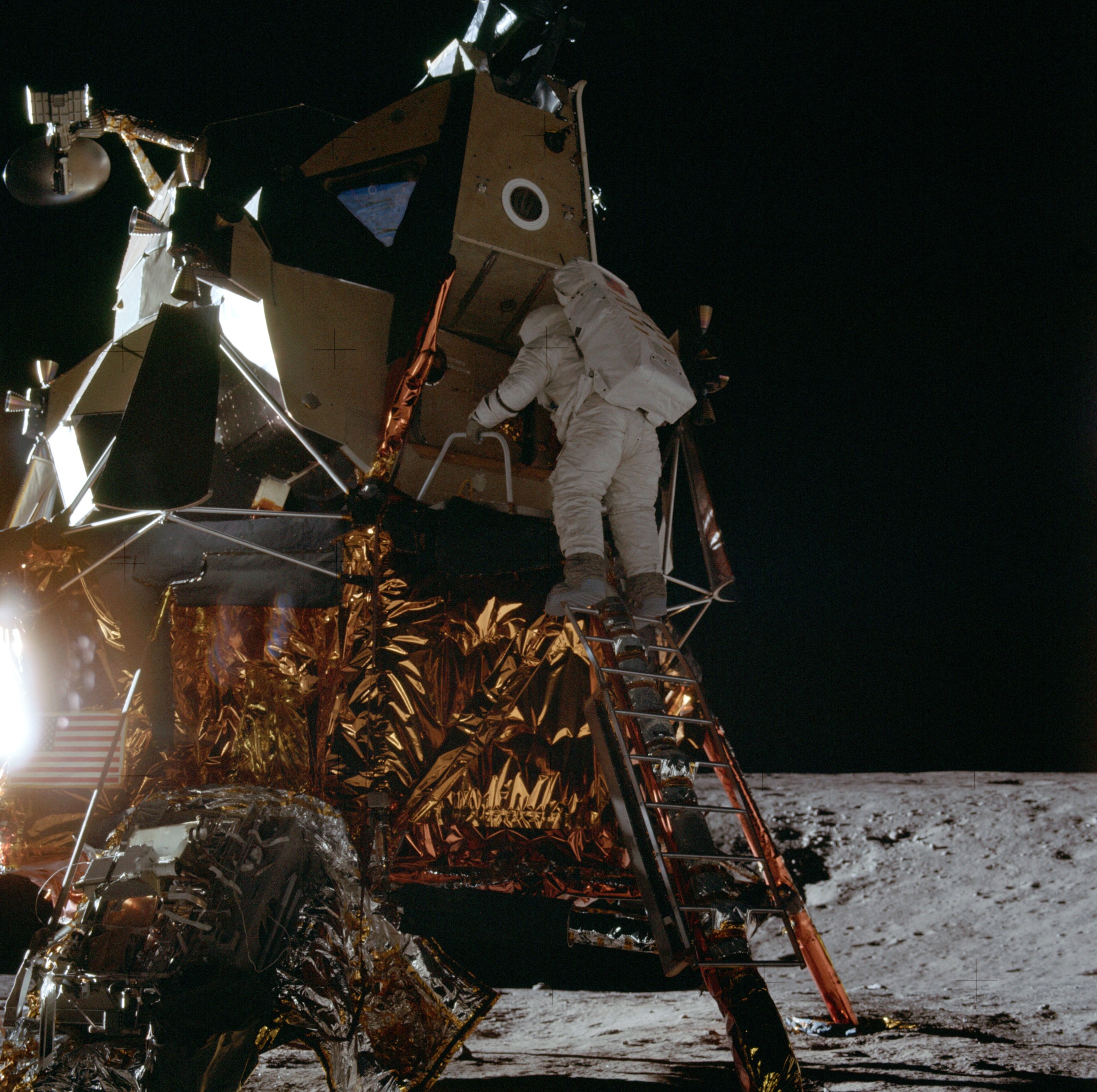 Apollo 12 Mission Image – Dark View of Astronaut Alan L. Bean Climbing ...