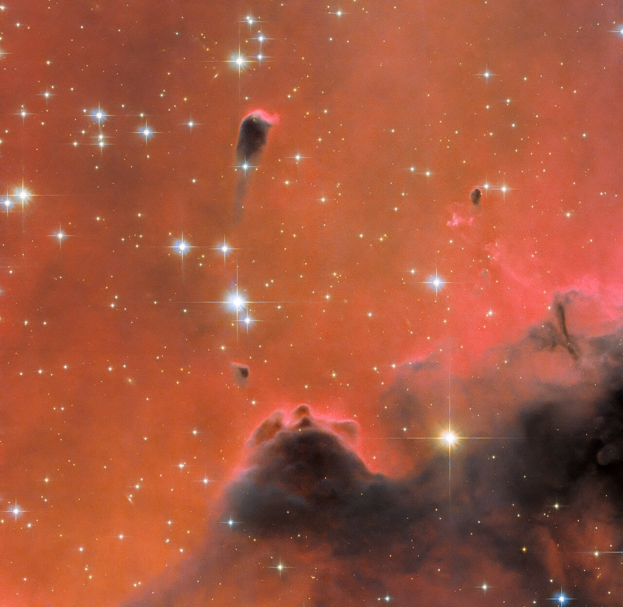 Hubble Views a Glistening Red Nebula - NASA Science