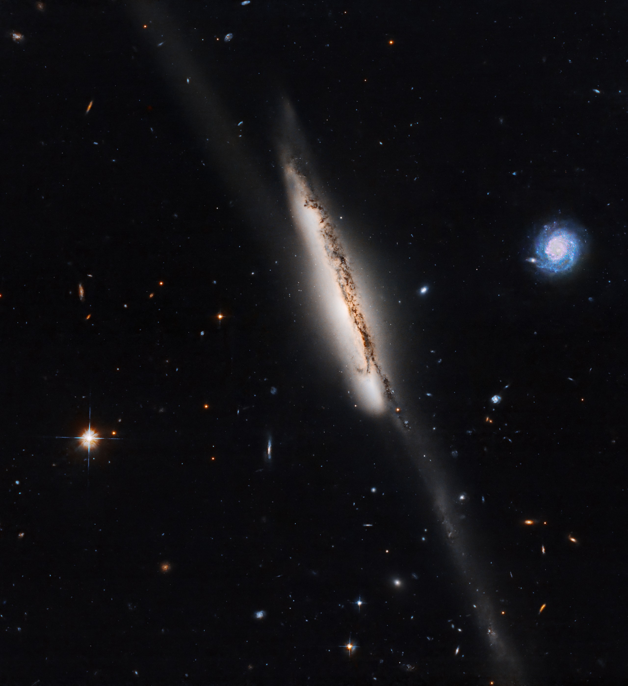 Hubble Captures a Faint Bridge of Stars - NASA Science