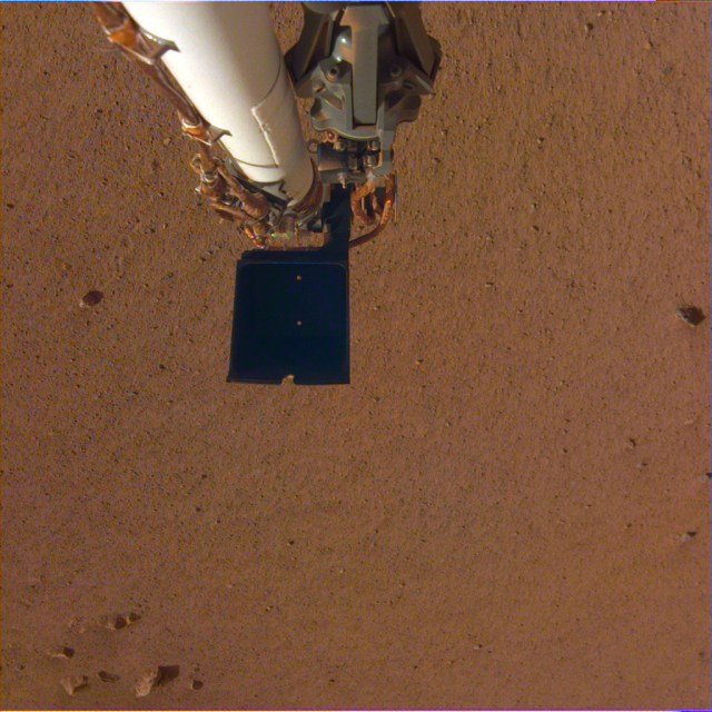 Insight's Robotic Arm Over Martian Soil - NASA Science