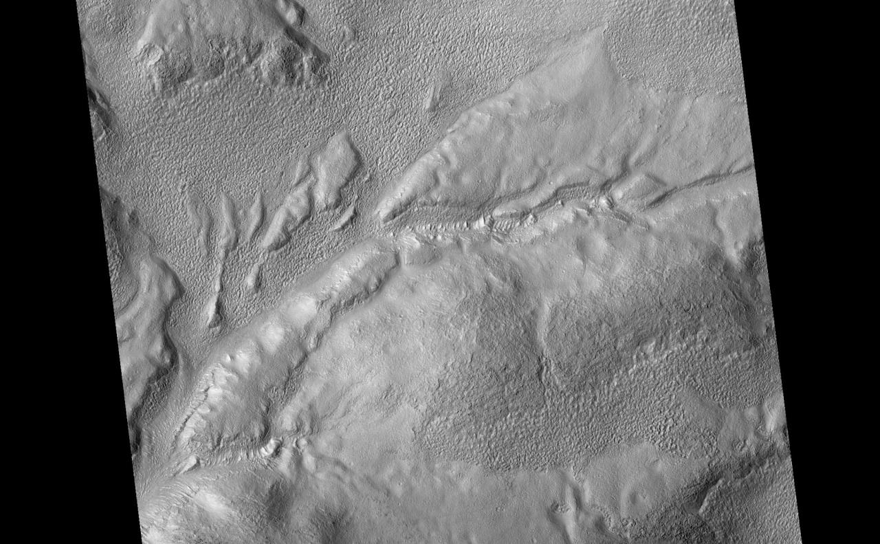Gullies and Flow Features along Crater Wall in Promethei Terra - NASA ...