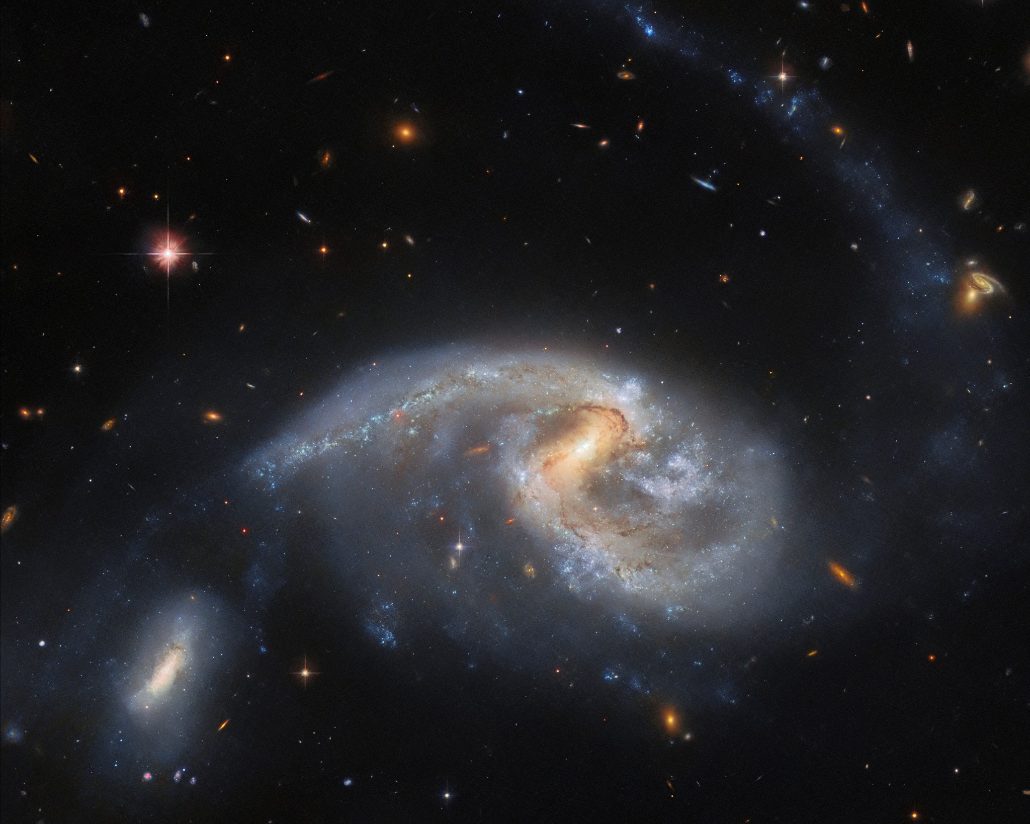 Hubble Peers at Pair of Closely Interacting Galaxies - NASA Science