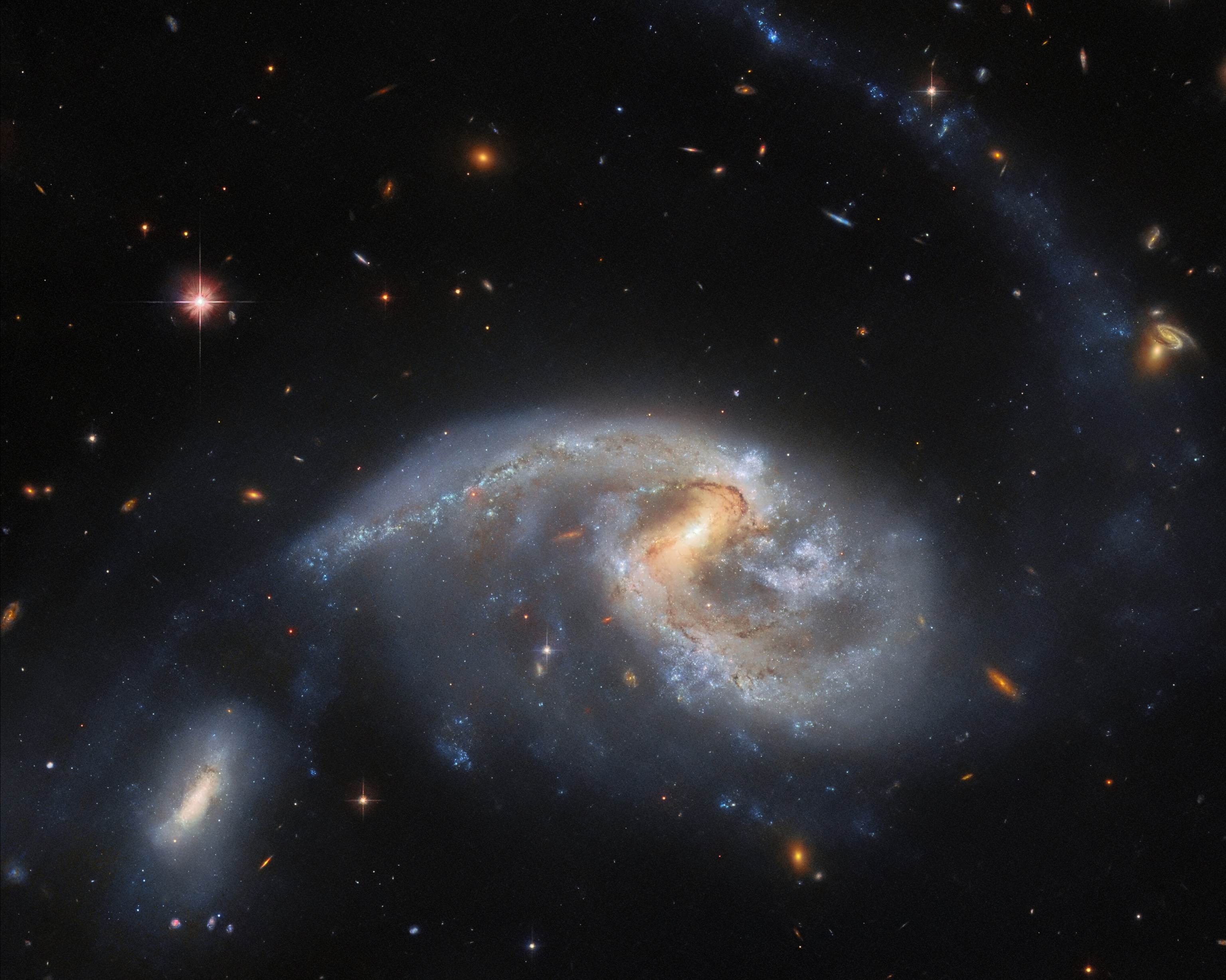 Hubble Peers at Pair of Closely Interacting Galaxies - NASA Science