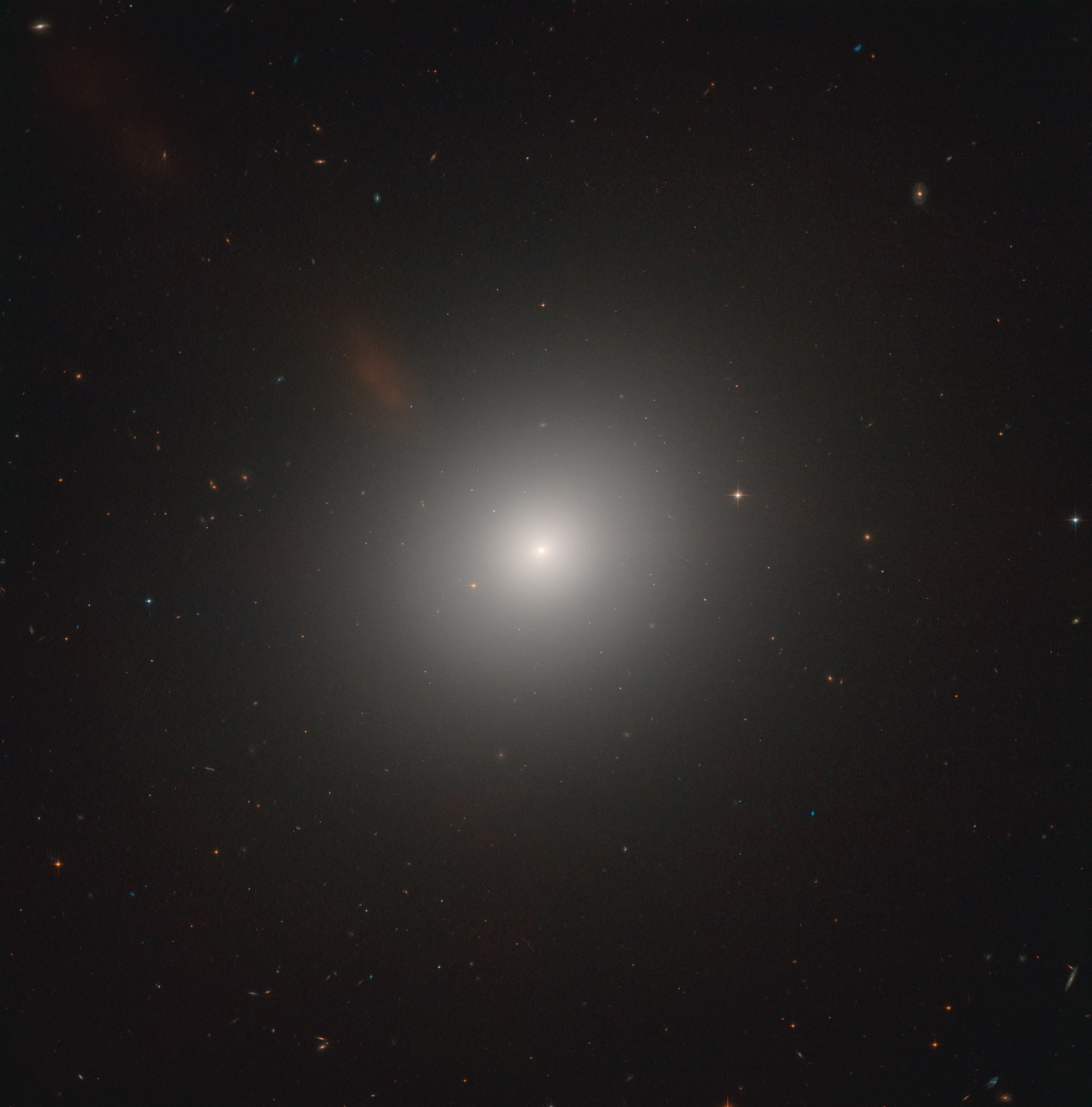 Hubble Explores the Elliptical Galaxy Messier 105 (M105)