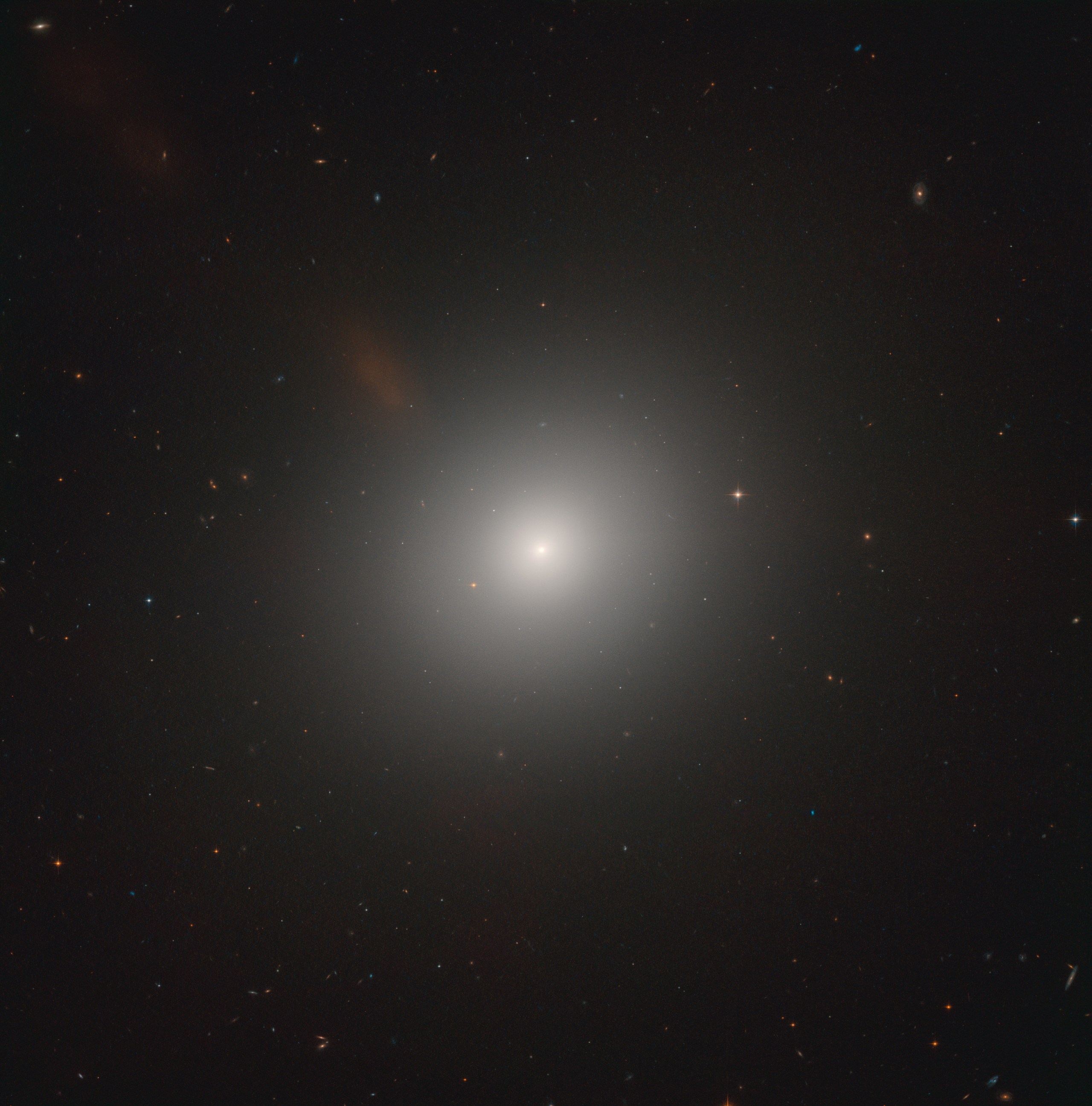 Hubble Explores the Elliptical Galaxy Messier 105 (M105)