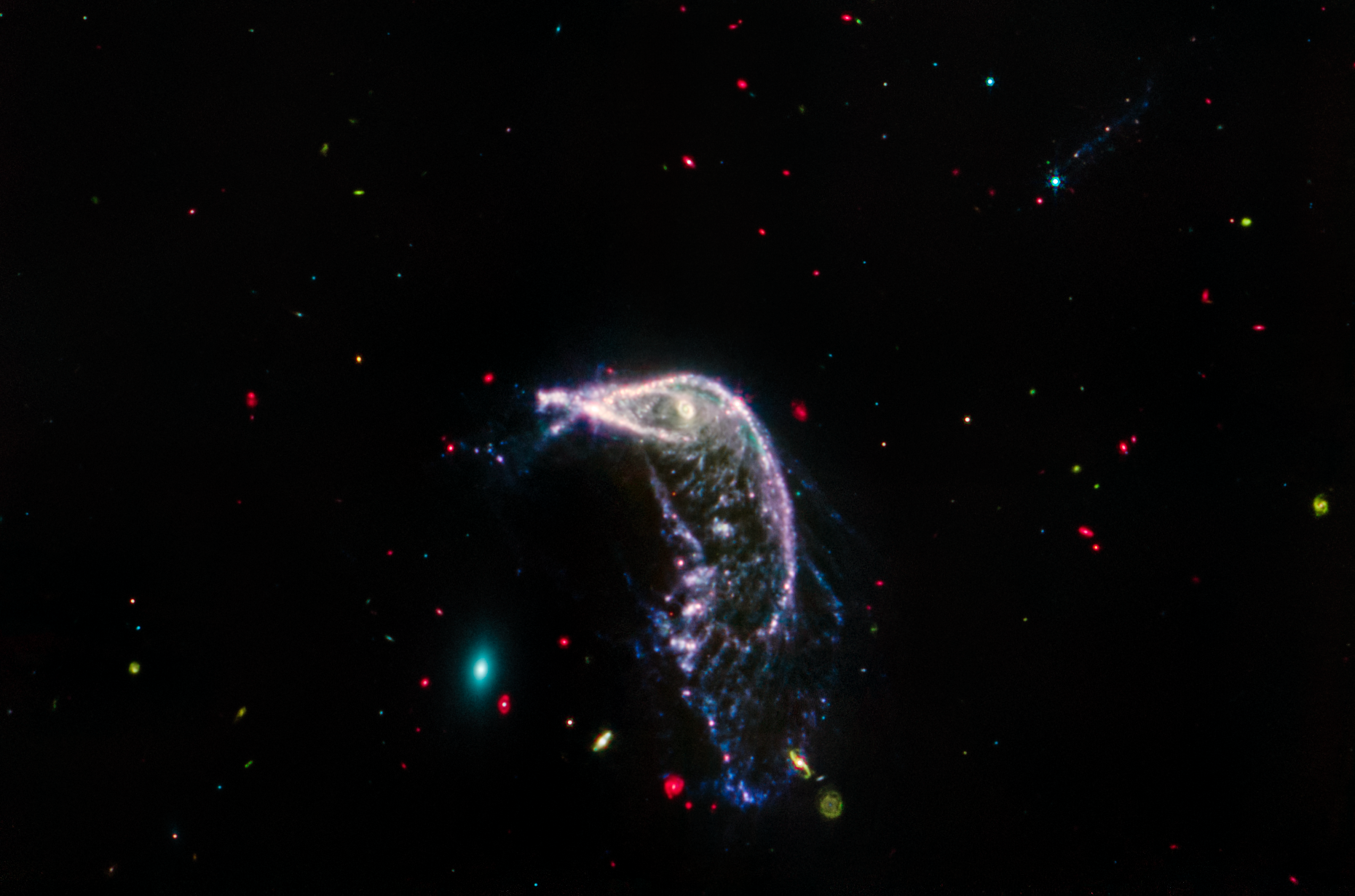 Vivid Portrait of Interacting Galaxies Marks Webb’s Second Anniversary - NASA Science