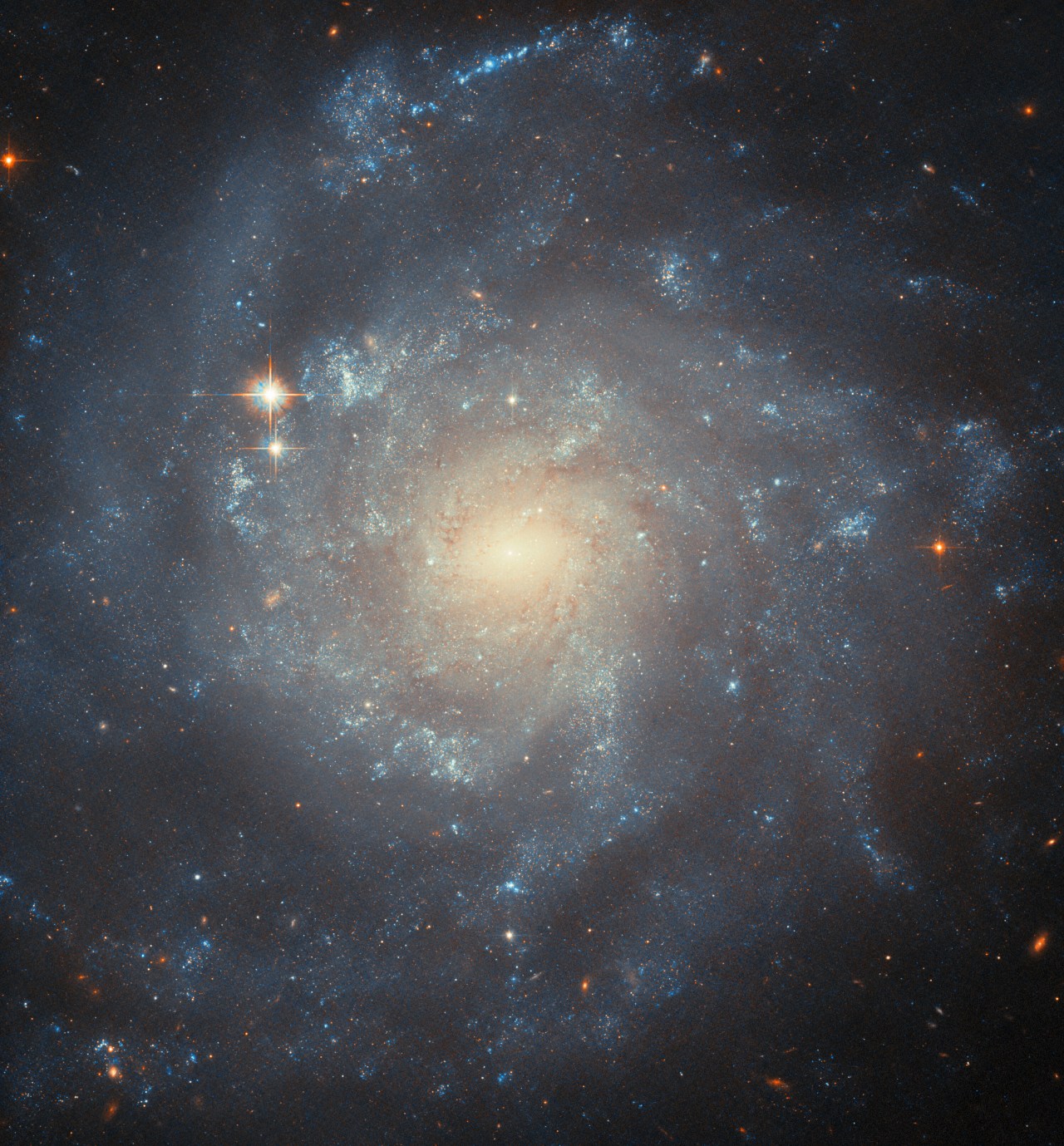 Hubble Examines a Spiral Star Factory - NASA Science