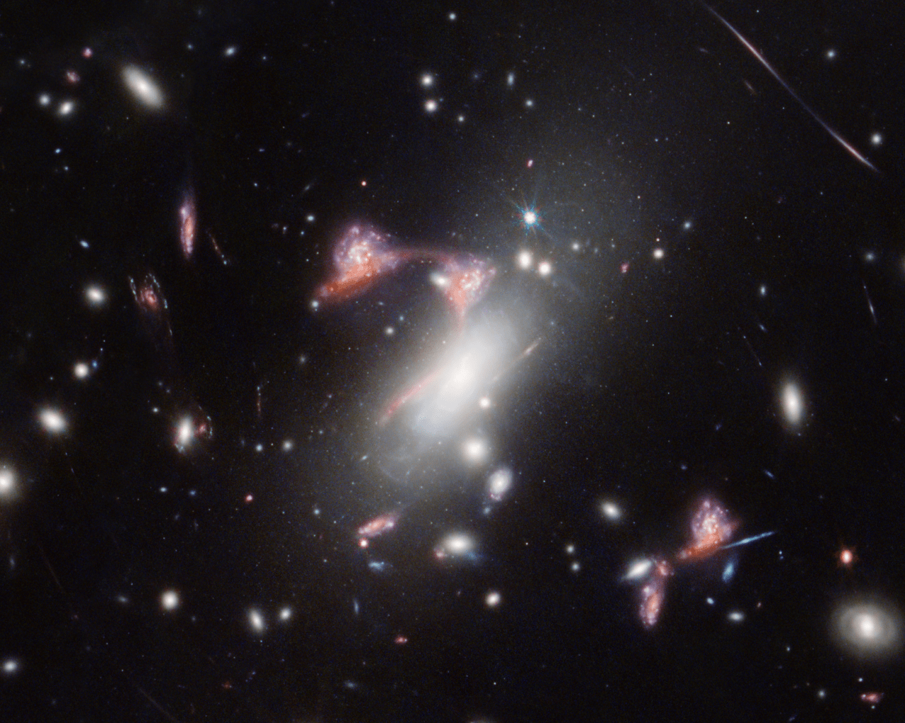 NASA’s Webb Reveals Distorted Galaxy Forming Cosmic Question Mark ...