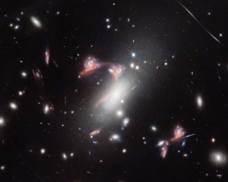 NASA’s Webb Reveals Distorted Galaxy Forming Cosmic Question Mark ...